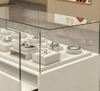 China Modern Minimalist White Glass Jewelry Display Counter, Lockable Retail Showcase with Storage Drawers for sale