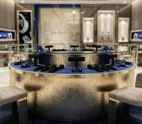 China Luxury Gold Round Jewelry Kiosk, Complete Turnkey Retail Display Center with Blue Velvet Inserts & Matching Counters for sale