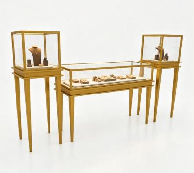 China Luxury Gold Minimalist Jewelry Display Set, Complete Turnkey Showcase with Pedestal & Counter for sale
