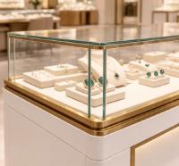 China Luxury White & Rose Gold Jewelry Store Display Set, Complete Turnkey Fixture Package with Counters, Wall Cabinets & Seating for sale