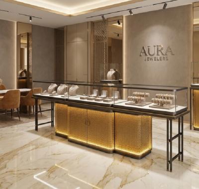 China Customizable Sleek Modern Jewelry Retail Showcase, Central Kiosk with Illuminated Gold Cabinets for Fine Jewelry Boutiques for sale