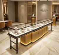 China Customizable Sleek Modern Jewelry Retail Showcase, Central Kiosk with Illuminated Gold Cabinets for Fine Jewelry Boutiques for sale