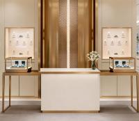 China Modern Luxury Jewelry Display Desk with LED Lighting Durable & Easy Clean White & Gold Glass Showcase for Retail for sale