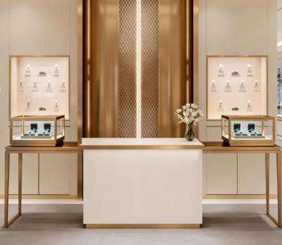 China Modern Luxury Jewelry Display Desk with LED Lighting Durable & Easy Clean White & Gold Glass Showcase for Retail for sale