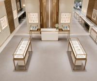 China Modern Luxury Jewelry Display Desk with LED Lighting Durable & Easy Clean White & Gold Glass Showcase for Retail for sale