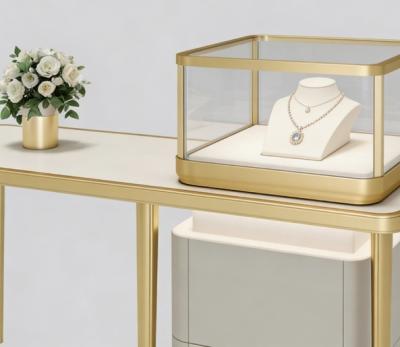 China Luxury Gold Jewelry Display Table with Removable Glass Showcase & Storage Drawer LED Lighting for Showroom & Retail Store Use for sale