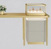 China Luxury Gold Jewelry Display Table with Removable Glass Showcase & Storage Drawer LED Lighting for Showroom & Retail Store Use for sale