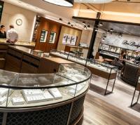 China Modern Walnut Wood & Black Metal Jewelry Store Interior Design, Complete Turnkey Fixture Package with Curved Central Showcase for sale