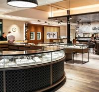 China Modern Walnut Wood & Black Metal Jewelry Store Interior Design, Complete Turnkey Fixture Package with Curved Central Showcase for sale
