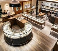 China Modern Walnut Wood & Black Metal Jewelry Store Interior Design, Complete Turnkey Fixture Package with Curved Central Showcase for sale