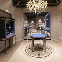 China Blue Velvet Jewelry Display Stand; Curved Glass Tall Jewelry and Watch Display Case; Luxury Retail Store Display Cabinet for sale