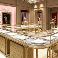China Luxury Champagne Gold LED Eco-Friendly Jewelry Store Interior Design Complete Turnkey Fixture Package U-Shaped Central Showcase for sale