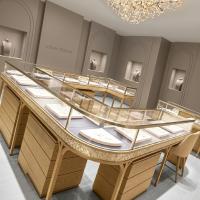 China Luxury Champagne Gold LED Eco-Friendly Jewelry Store Interior Design Complete Turnkey Fixture Package U-Shaped Central Showcase for sale