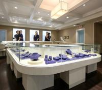 China Modern White Textured Oval Jewelry Store Interior Design, Complete Turnkey Fixture Package with Central Island Showcase for sale