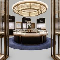 China Round Curved Glass Jewellery Display Counter Gold Frame Wall Standing Necklace Showcase Custom Brand Jewelry Cabinet Package for sale