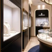 China Round Curved Glass Jewellery Display Counter Gold Frame Wall Standing Necklace Showcase Custom Brand Jewelry Cabinet Package for sale