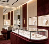 China Luxury Burgundy Velvet LED Jewelry Store Showroom Interior Design Complete Turnkey Fixture Package Curved Display Counters Wall for sale