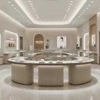 China Elegant Glass Jewelry Vitrine Stainless Steel Frame Luxury Store Display Furniture for sale