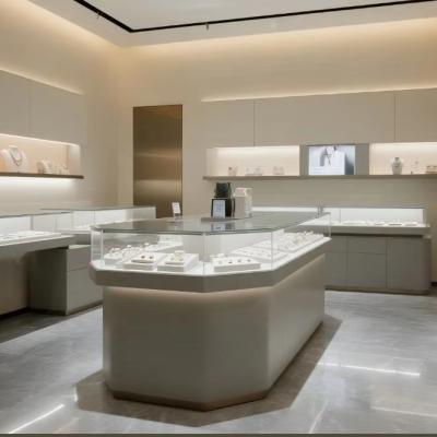 China Wide Glass Jewelry Showcase Stainless Steel Frame with Spotlight for Diamond Display for sale