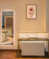 China Custom Jewelry Display Counter   Stainless Steel Frame Tempered Glass LED Light Jewellery Showcase for Luxury  Jewelry Boutique for sale