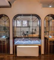 China Custom Jewelry Display Counter   Stainless Steel Frame Tempered Glass LED Light Jewellery Showcase for Luxury  Jewelry Boutique for sale