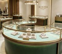 China Luxury Circular Green Leather & Gold Jewelry Display Counter, Modern Central Showcase with LED Lighting & Glass Top for sale