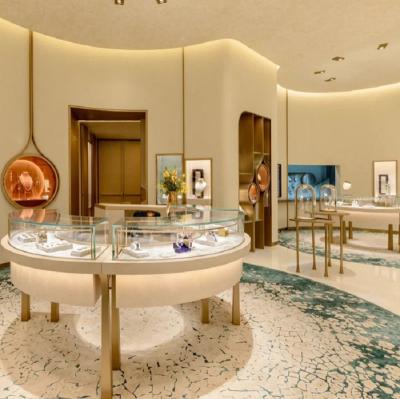 China Luxury Beige Curved & Gold Jewelry Store Display Set, Complete Turnkey Fixture Package with LED Lighting & Glass Cases for sale