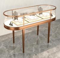 China Luxury Rose Gold Oval Jewelry Display Case, Premium Glass Jewelry Showcase for High-End Jewelry Stores for sale