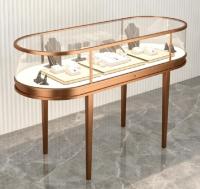 China Luxury Rose Gold Oval Jewelry Display Case, Premium Glass Jewelry Showcase for High-End Jewelry Stores for sale