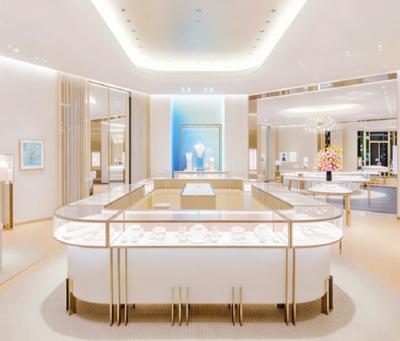 China Luxury White & Gold Curved Jewelry Display Island, Premium Glass Jewelry Showcase for High-End Jewelry Stores for sale