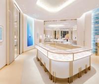China Luxury White & Gold Curved Jewelry Display Island, Premium Glass Jewelry Showcase for High-End Jewelry Stores for sale