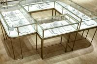 China Commercial Interior Design of Luxury Jewelry Display Showroom with Vintage Gold LED Display Cabinets for Shopping Mall for sale
