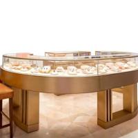 China Luxury Gold Metal Frame Jewelry Display Case with Tempered Glass Top and LED Lit for Retail Store for sale