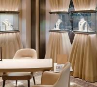 China Luxury Gold Metal Frame Jewelry Display Case with Tempered Glass Top and LED Lit for Retail Store for sale