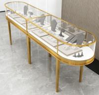China Luxury Octagonal Glass Jewelry Display Table Gold Frame LED Durable High Quality Circular Showcase for Jewelry Stores for sale
