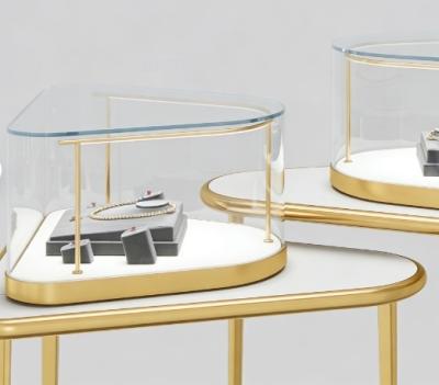 China Luxury Irregular Shape Jewelry Display Table with Gold Frame and LED Lighting Premium Curved Glass Showcase for sale