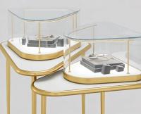 China Luxury Irregular Shape Jewelry Display Table with Gold Frame and LED Lighting Premium Curved Glass Showcase for sale
