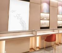 China Luxury Warm Apricot Curved Jewelry Display Cases High End Custom Glass Showcases with LED Lighted Base for Showroom for sale