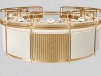 China Luxury Curved Gold LED Jewelry Display Case with Round Glass Showcase and Vertical Slat Panel for Ring Necklace Store for sale