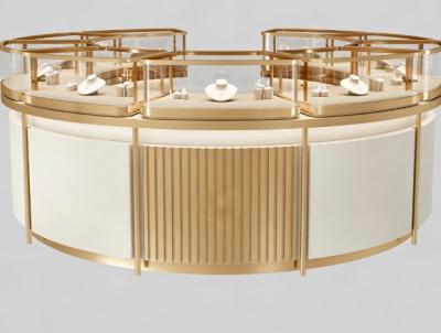 China Luxury Curved Gold LED Jewelry Display Case with Round Glass Showcase and Vertical Slat Panel for Ring Necklace Store for sale