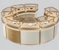 China Luxury Curved Gold LED Jewelry Display Case with Round Glass Showcase and Vertical Slat Panel for Ring Necklace Store for sale