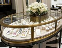 China Modern Circular Glass LED Jewelry Showcase with Central Floral Stand Luxury Store Display Counter for Rings & Necklaces for sale