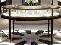 China Modern Circular Glass LED Jewelry Showcase with Central Floral Stand Luxury Store Display Counter for Rings & Necklaces for sale