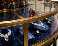 China Modern Circular Glass LED Jewelry Showcase with Central Floral Stand Luxury Store Display Counter for Rings & Necklaces for sale