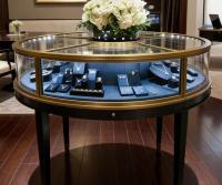 China Modern Circular Glass LED Jewelry Showcase with Central Floral Stand Luxury Store Display Counter for Rings & Necklaces for sale