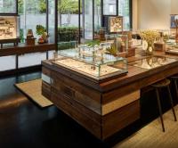 China Wabi-Sabi Dark Walnut Natural Texture LED Jewelry Display Cases High End Custom Glass Showcases Solid Wood Base Retail Store for sale