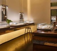 China Wabi-Sabi Dark Walnut Natural Texture LED Jewelry Display Cases High End Custom Glass Showcases Solid Wood Base Retail Store for sale