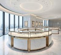China Luxury Island Jewelry Display Counter Marble Base Gold Trim Glass Showcase LED Lights GZowin Brand Customized Design Luxury for sale