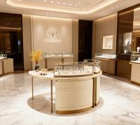 China Luxury Curved Reception Jewelry Display Counter | Beige Body Brushed Gold Frame Side Table | Curved Acrylic/Glass Showroom for sale