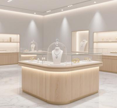 China Rounded Corner Island Jewelry Display Counter | Light Wood Body Gold Trim Glass Showcase | Built-in LED Lights High Showroom for sale